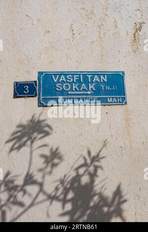 Pretty blue street sign with shadows, a typical traditional lane in ...