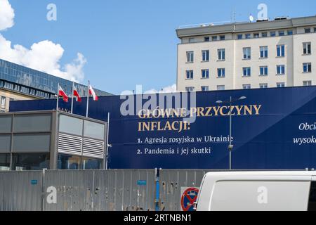 Causes of inflation in Poland. Information banner on the fence ...