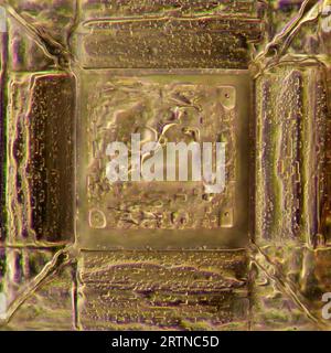 The image presents a single crystal of recrystallized salt ...