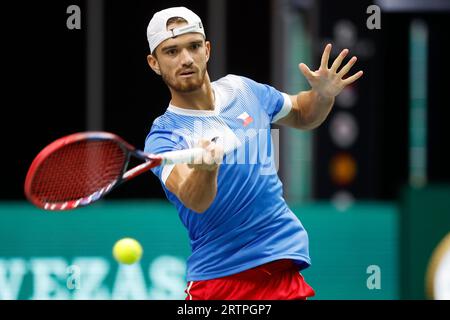 Tomas Machac, of the Czech Republic, returns to Brandon Nakashima, of ...