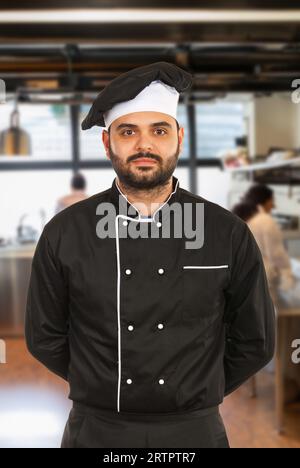 Proud cook with pot in the kitchen wearing apron , Modern housewife ...