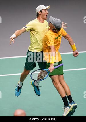 Max Purcell, left, and Matthew Ebden, right, of Australia, raise the ...