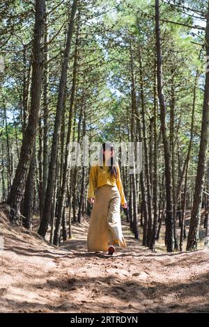 A vertical shot of a walking path in a field Stock Photo - Alamy