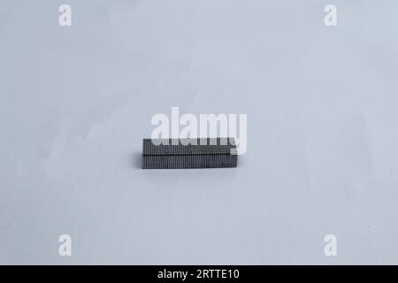Stapler bullet isolated on white background Stock Photo - Alamy