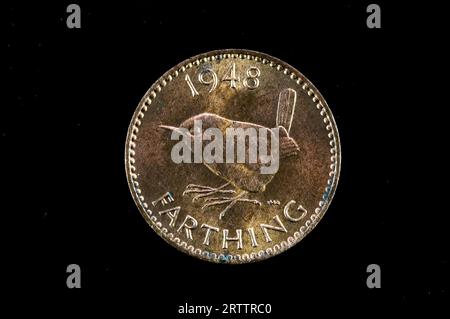 One farthing coin of pre-decimal currency, pounds, shillings and pence ...