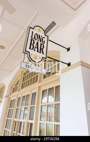 The historic Long Bar at Raffles Hotel, Singapore—home of the Singapore ...