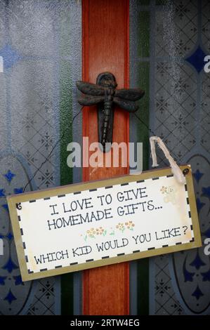 Homemade gifts sign hanging on a front door, UK Stock Photo - Alamy