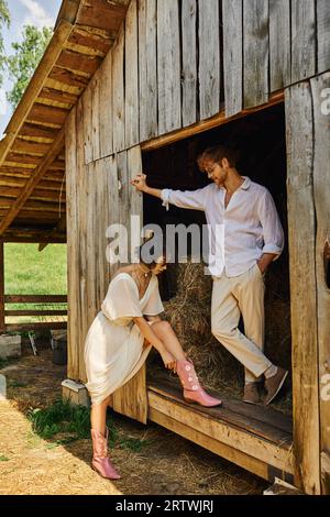 Young redhead man wearing stylish sunglasses clueless and confused ...