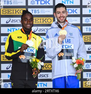 Wayne Pinnock of Jamaica with his silver medal for long jump on day ...