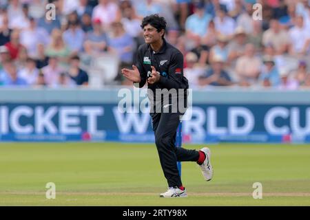 New Zealand's Rachin Ravindra celebrates after making 100 runs against ...