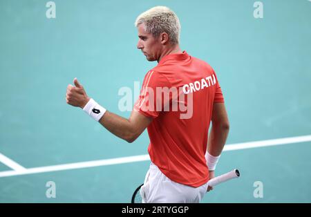 Borna Gojo of Croatia gestures against Gael Monfils of France during ...