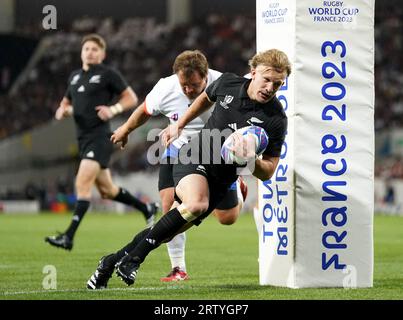 New Zealand's Damian McKenzie scores their side's third try during the ...