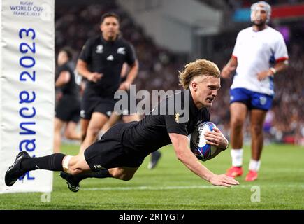 New Zealand's Damian McKenzie scores their side's third try during the ...