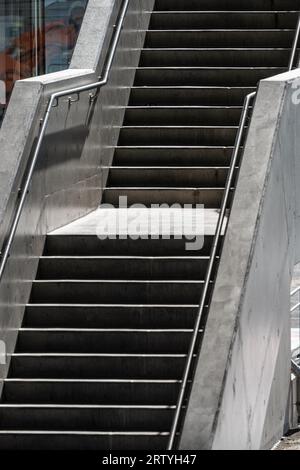 Tall concrete stairs in sunshine Stock Photo - Alamy