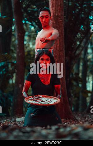 a couple of serial killers have bodies covered in blood and are ...