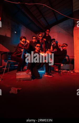 a group of delinquent teenagers wearing glasses and black clothes were ...