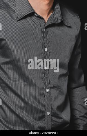 Close up of dark Men's shirt. Copy space Stock Photo - Alamy