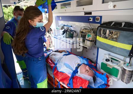 Medical team transports a patient with polytrauma Stock Photo - Alamy