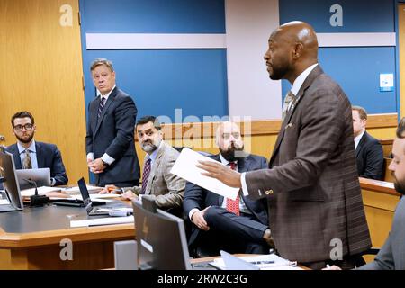 Fulton County Superior Judge Scott McAfee looks through paperwork ...