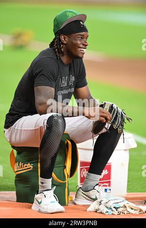 Oakland Athletics outfielder Lawrence Butler, right, high-fives ...