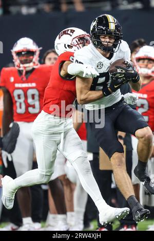 Vanderbilt wide receiver London Humphreys (83) walks off the field ...