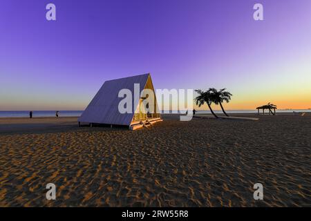 Triangle cabin on the beach, North China Stock Photo - Alamy