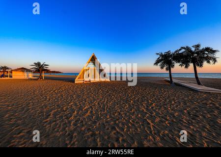 Triangle cabin on the beach, North China Stock Photo - Alamy