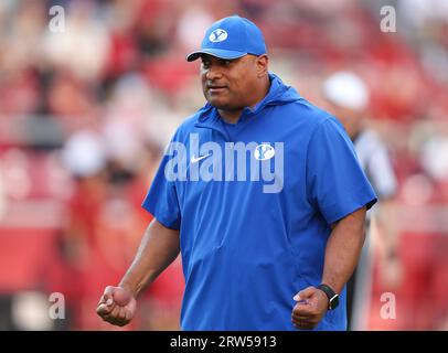 BYU head coach Kalani Sitake, center, is doused as he and his players ...