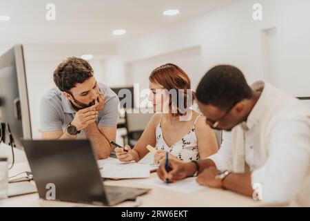 Business teammates projects, strategizing, and sharing ideas in a ...