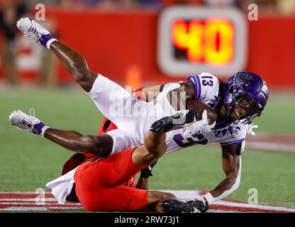TCU wide receiver Jaylon Robinson (13) fakes a pitch to JoJo Earle (11 ...