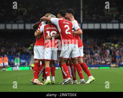 Arsenal's Leandro Trossard (second left) celebrates scoring their side ...