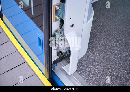 The mechanism of closing and opening doors in a subway train car/ Close ...
