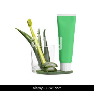 Tube of toothpaste, brush and aloe vera leaves on white background ...