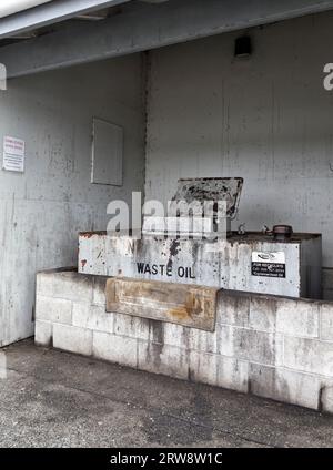 Container, holding used 'marine' engine oils to be recycled, boat ...