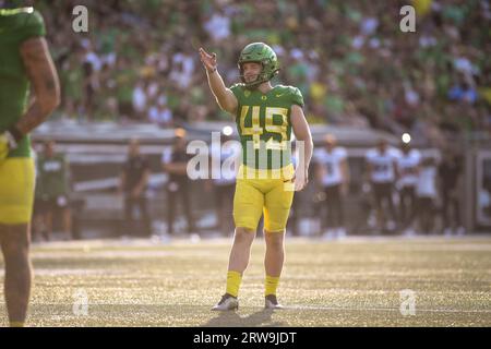 Oregon place kicker Camden Lewis (49) celebrates the go-ahead field ...