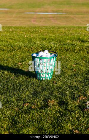 Golf Balls in Basket Stock Photo - Alamy