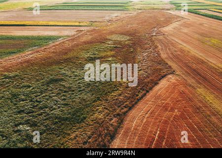 Vast meadow in the countryside area during a cloudy day Stock Photo - Alamy