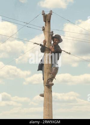 Worker repairing telegraph line, circa 1862-63. Photographed by Andrew ...
