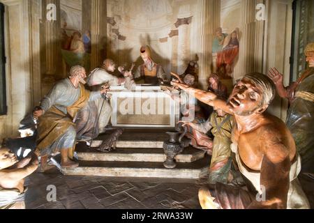 A figure depiction Jesus Christ being crucified is displayed on a ...