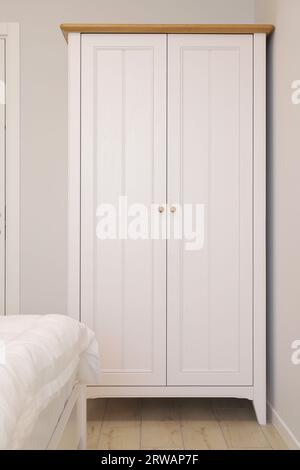 Wooden white cabinet, wardrobe in provence style Stock Photo - Alamy
