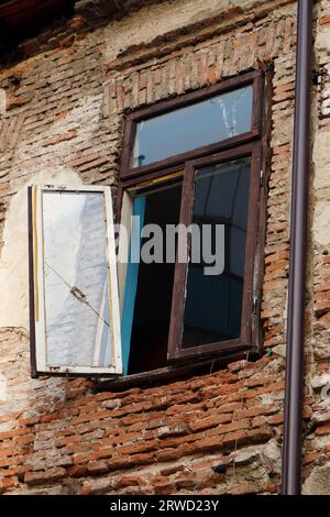 An old window in a decaying brick wall Stock Photo - Alamy