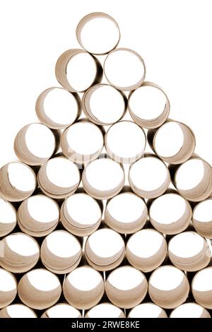 Toilet paper rolls stacked against blue background Stock Photo - Alamy
