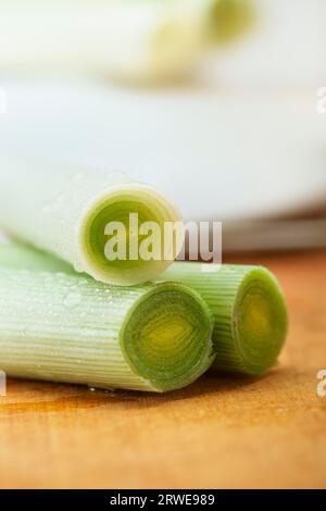 Leek sticks for preparation on a board Stock Photo - Alamy