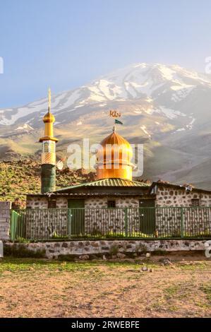 Mosque underneath volcano Damavand, highest peak in Iran Stock Photo ...