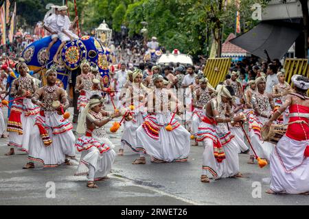 Udekki Players perform along a street of Kandy in Sri Lanka during the ...
