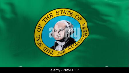 Close-up of Washington state flag waving. Dark green field with a seal ...