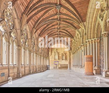 Covered walkway in the cloister of the norman built medieval cathedral ...