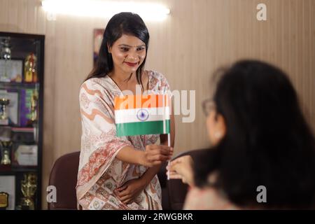 Principal Ma'am giving an Indian flag to a teacher as a gift, parent ...