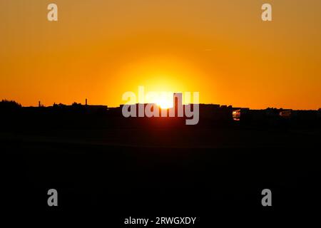 Sunset with a harsh contrast from light to dark Stock Photo - Alamy
