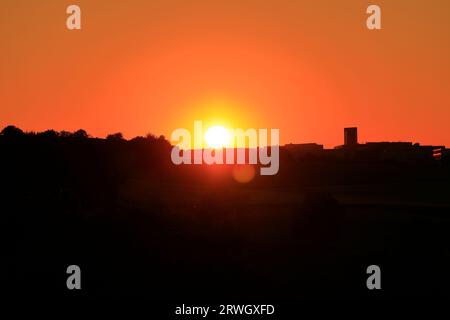 Sunset with a harsh contrast from light to dark Stock Photo - Alamy